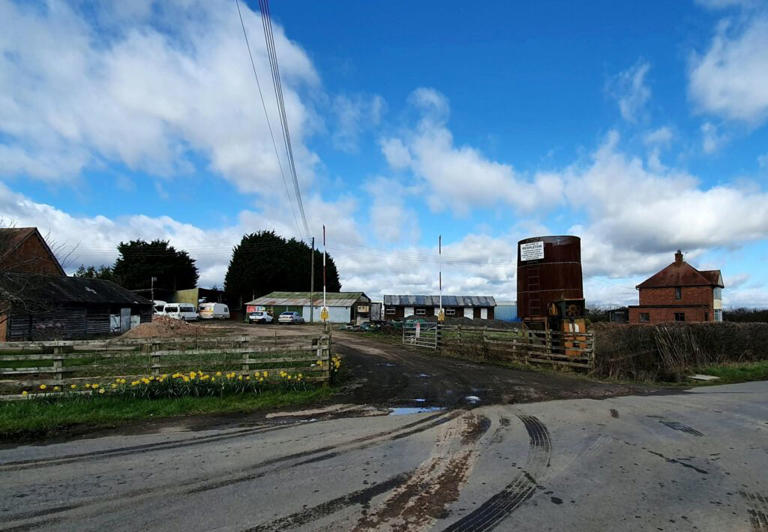 Angry farmer in fresh row over 15ft sign slagging off ‘nastiest village’
