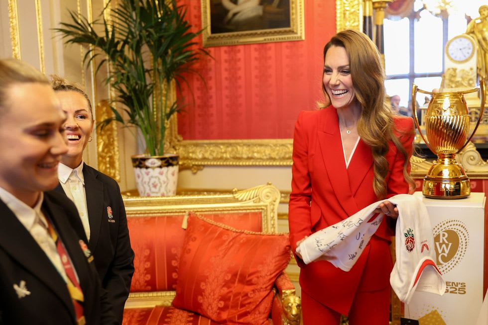 Kate shines in Alexander McQueen 'power suit' worth £1,980