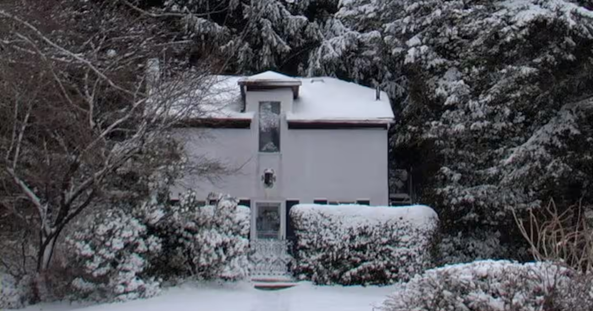 This snowy Rhode Island cottage is the coziest winter escape