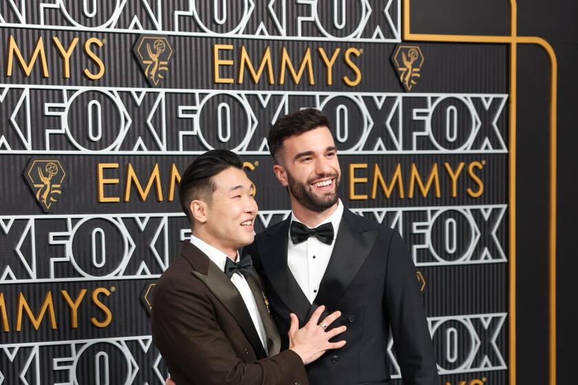 Comedian Joel Kim Booster marries video game producer Michael Sudsina ...