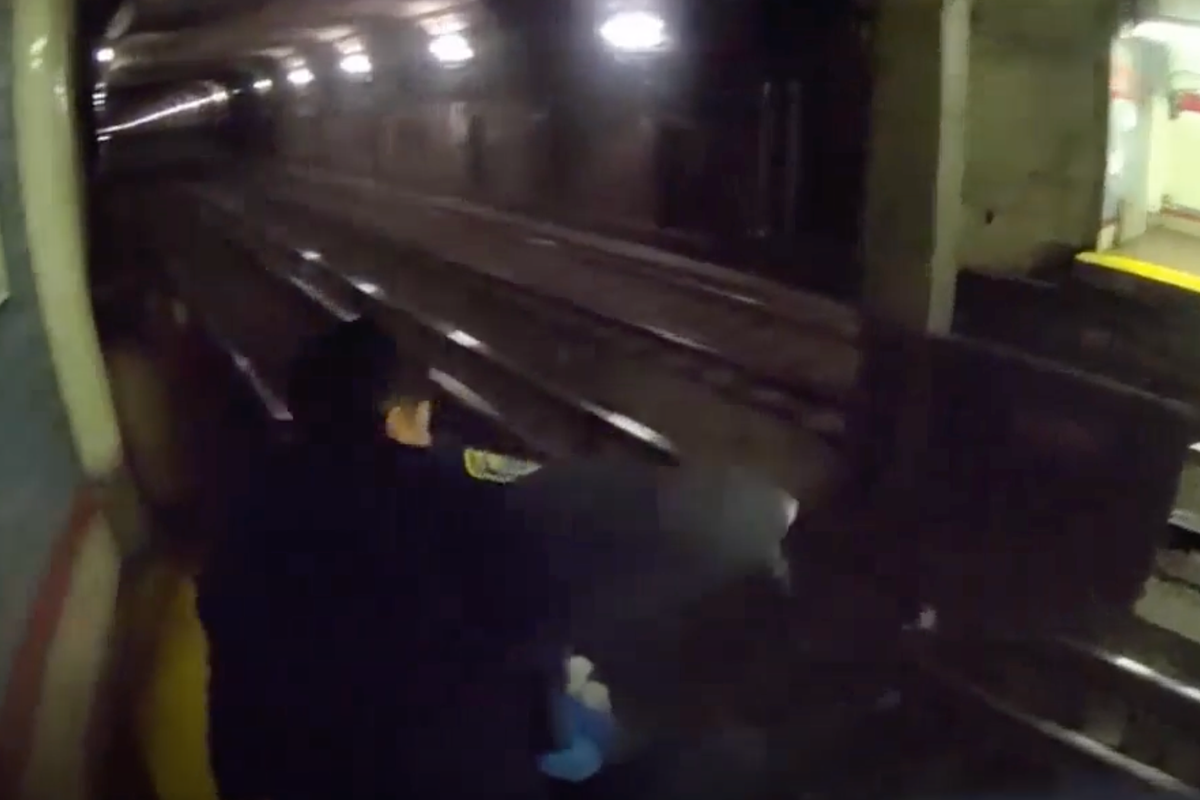Cops leap on to rail tracks to save person with train just minute away