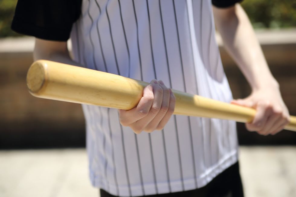 Elderly man confronts neighbour with baseball bat as parking row leaves ...