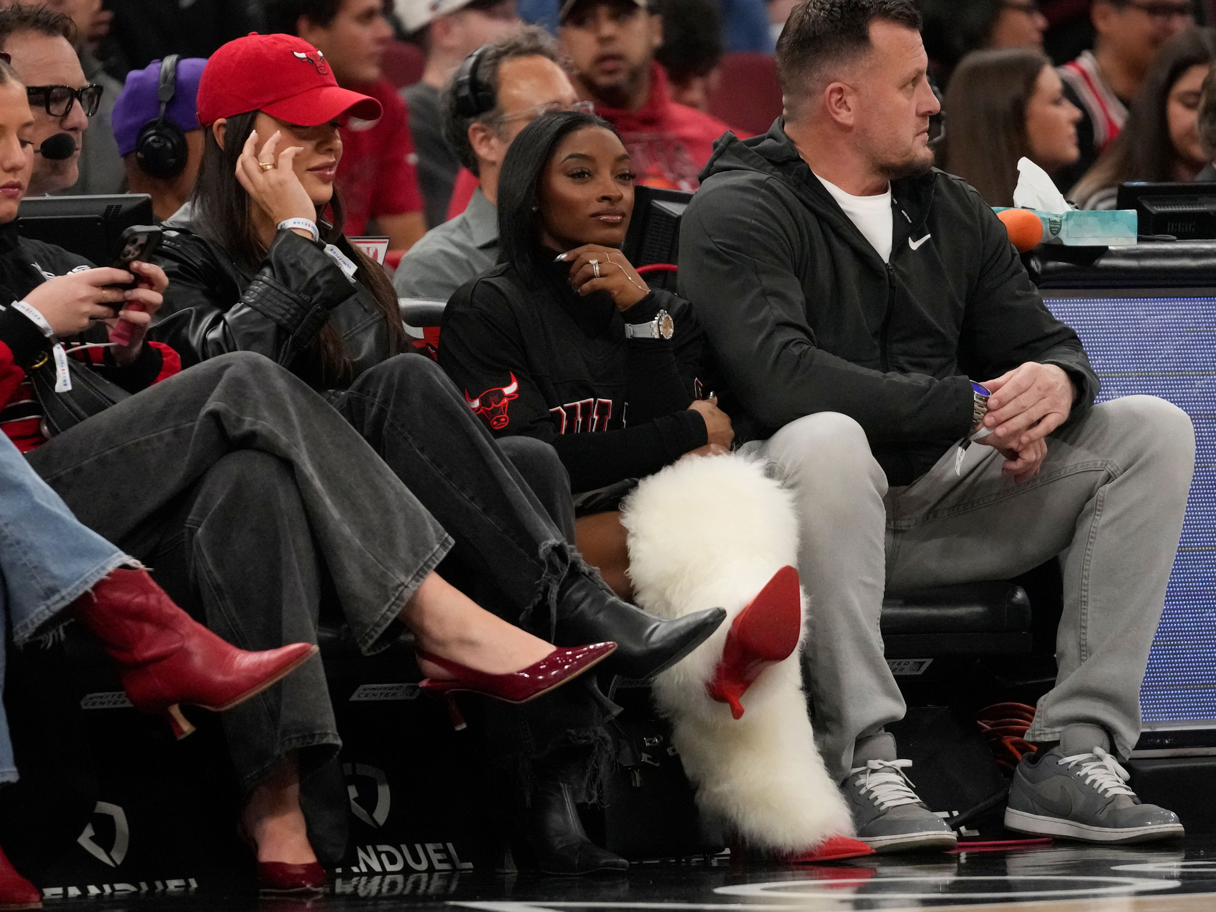 Simone Biles pairs $650 furry Ugg heels with an Hermès Kelly bag for ...