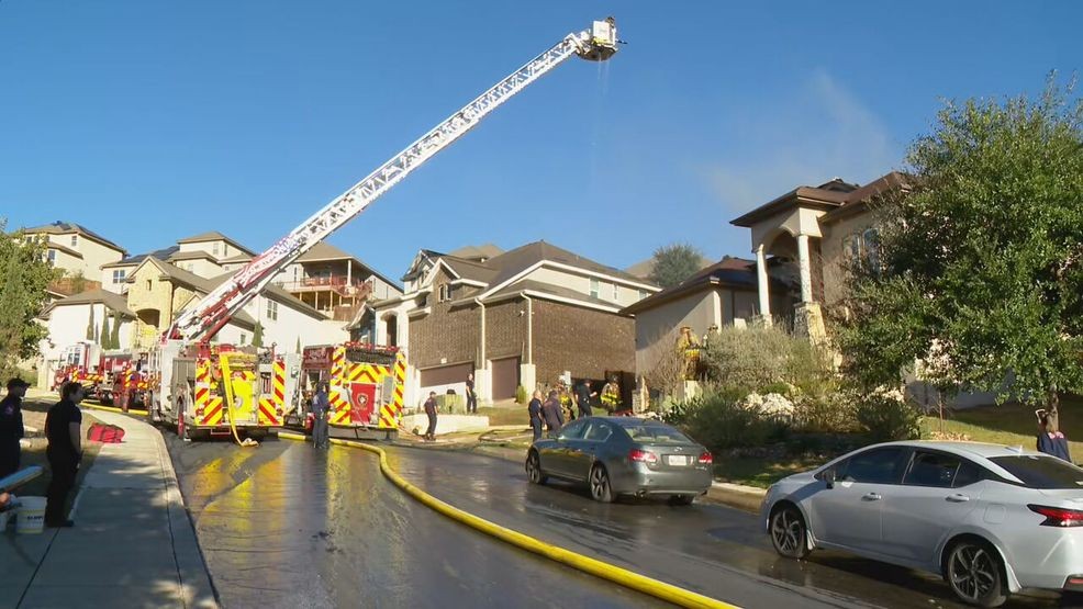 Fire breaks out in attic of family home, crews fight to stop spread of ...