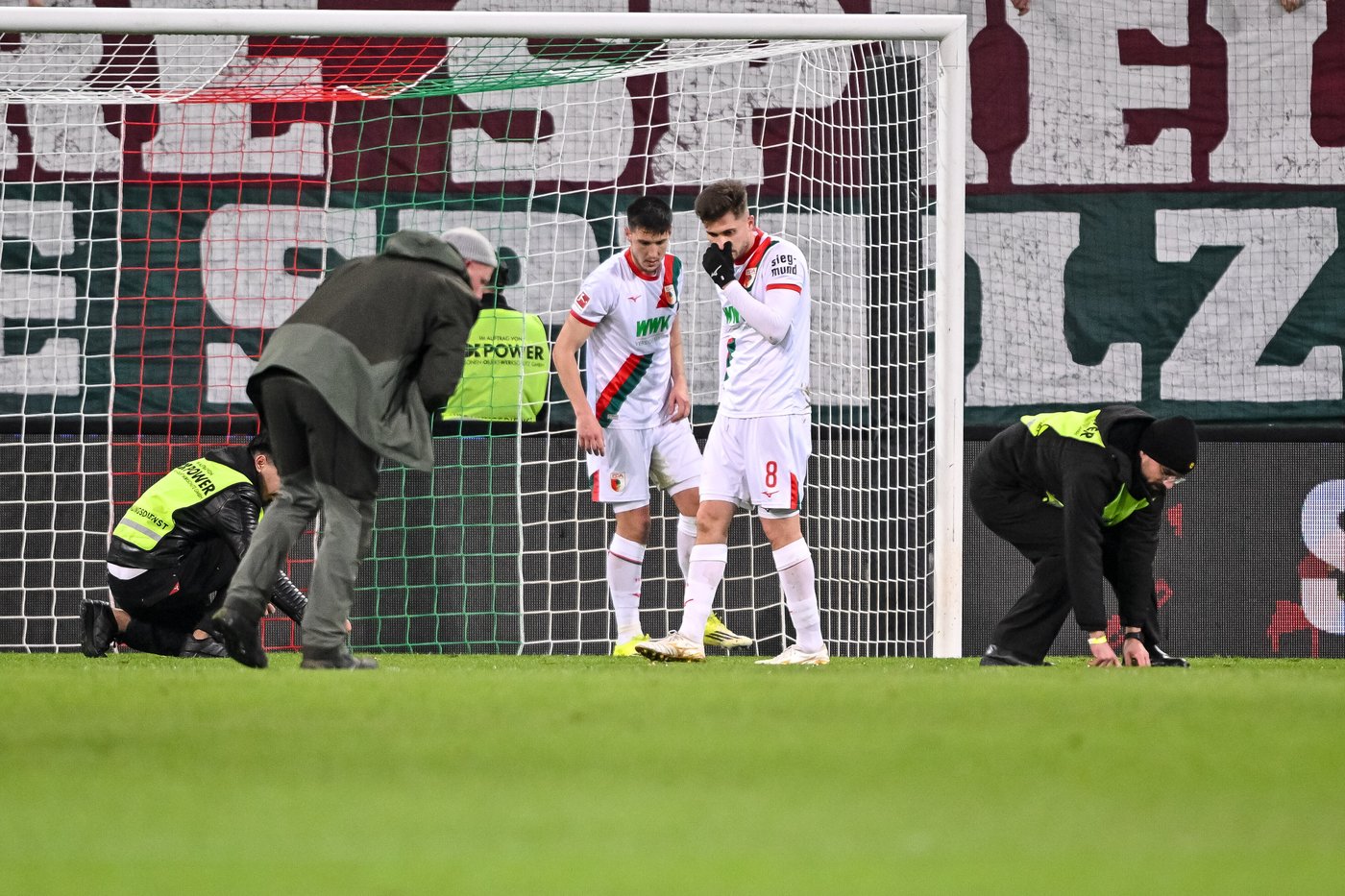 Union Berlin rescues a draw at Augsburg after fan protest interrupts ...