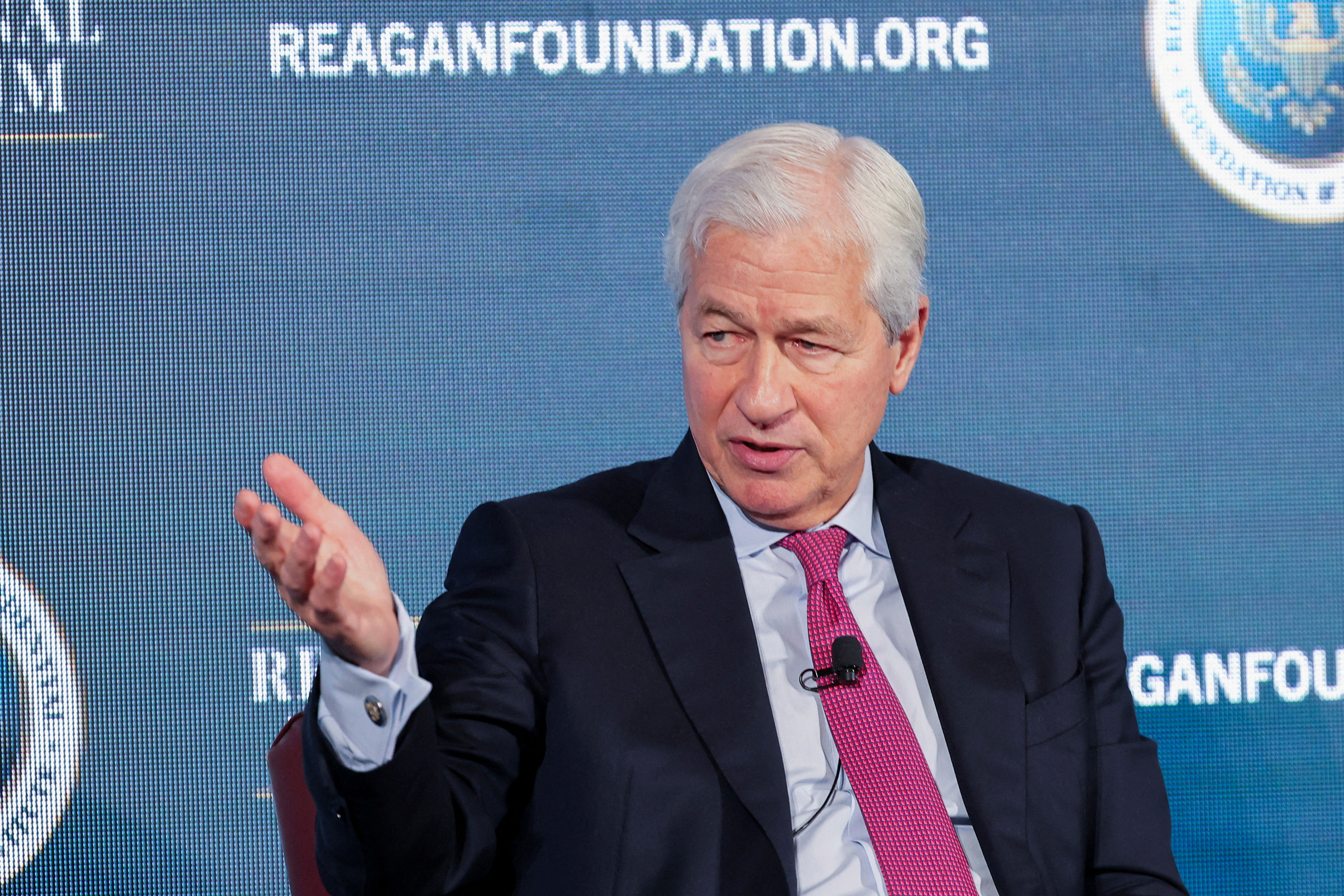 Jamie Dimon jokingly says he plans to stay in JPMorgan CEO job at least ...