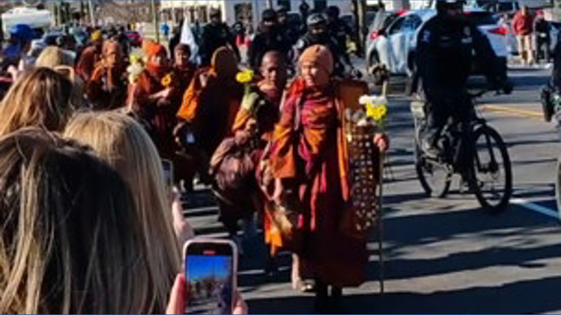 Buddhist monks march through Charlotte on peace walk