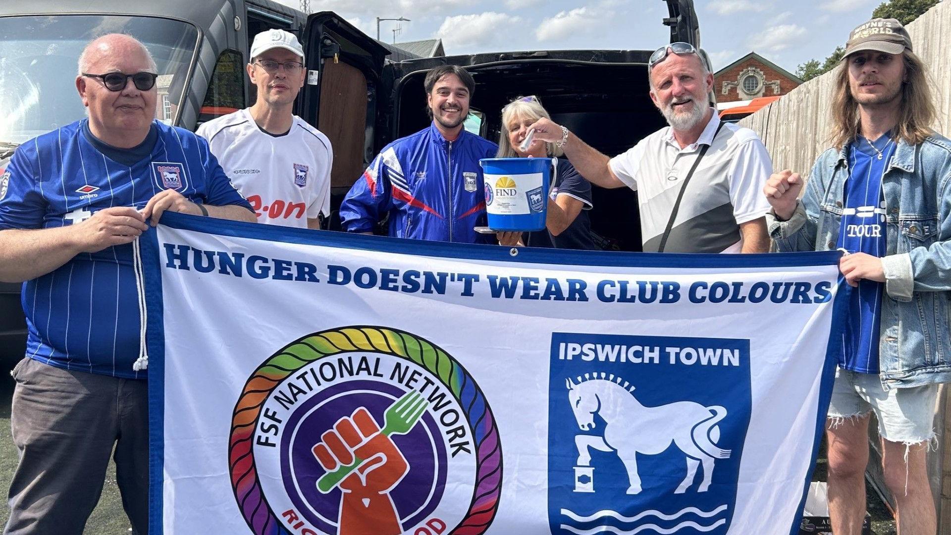 Football fan food bank fundraiser marks milestone