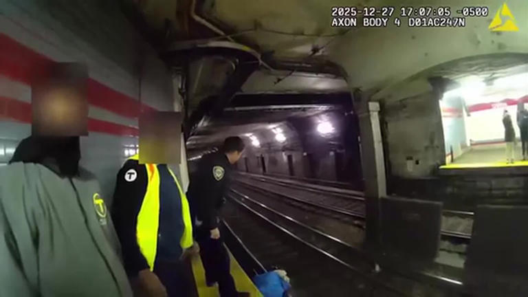 Watch: Body camera shows officers rescue a person who fell on subway ...