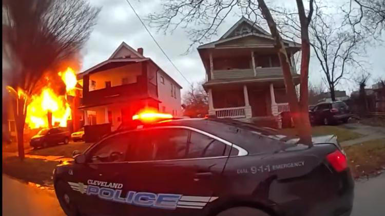 Watch: Bodycam video shows Cleveland police rescue family from burning home