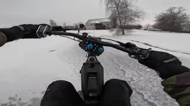 Studded Sur Ron ice ride on a thin backyard pond