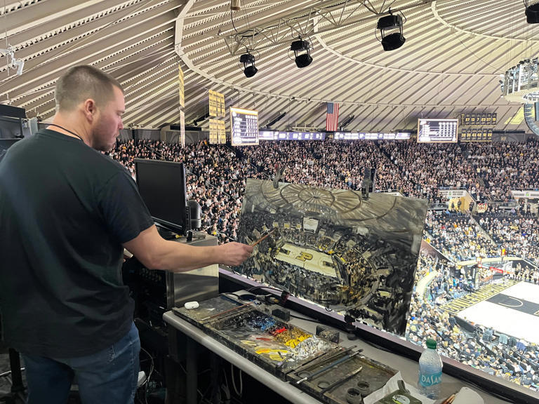 Capturing an atmosphere: Purdue alum paints Mackey Arena during 100th ...