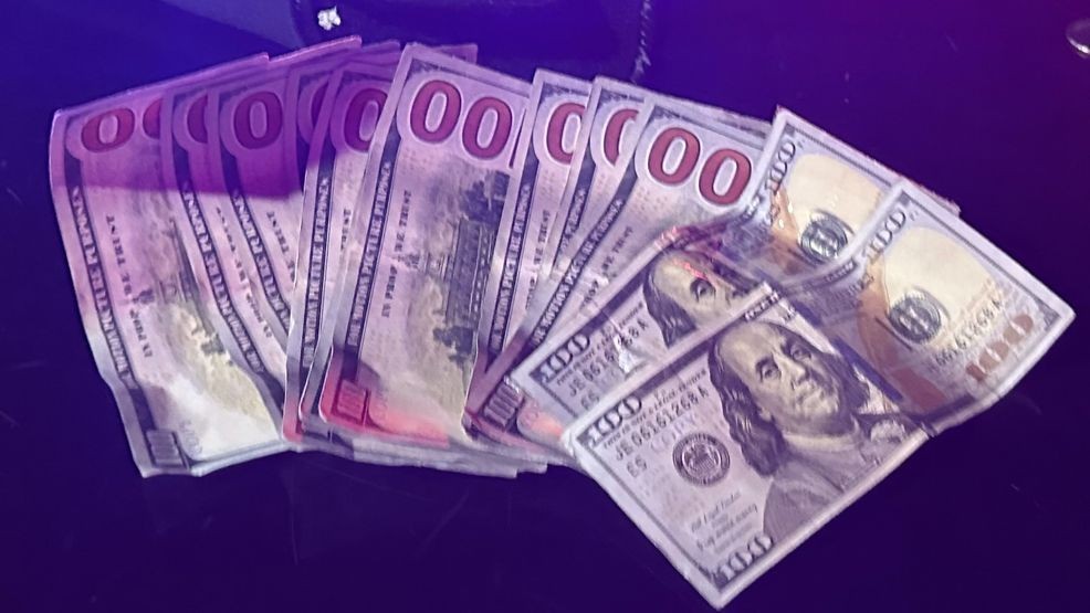 Driver with warrant arrested after counterfeit money found during ...