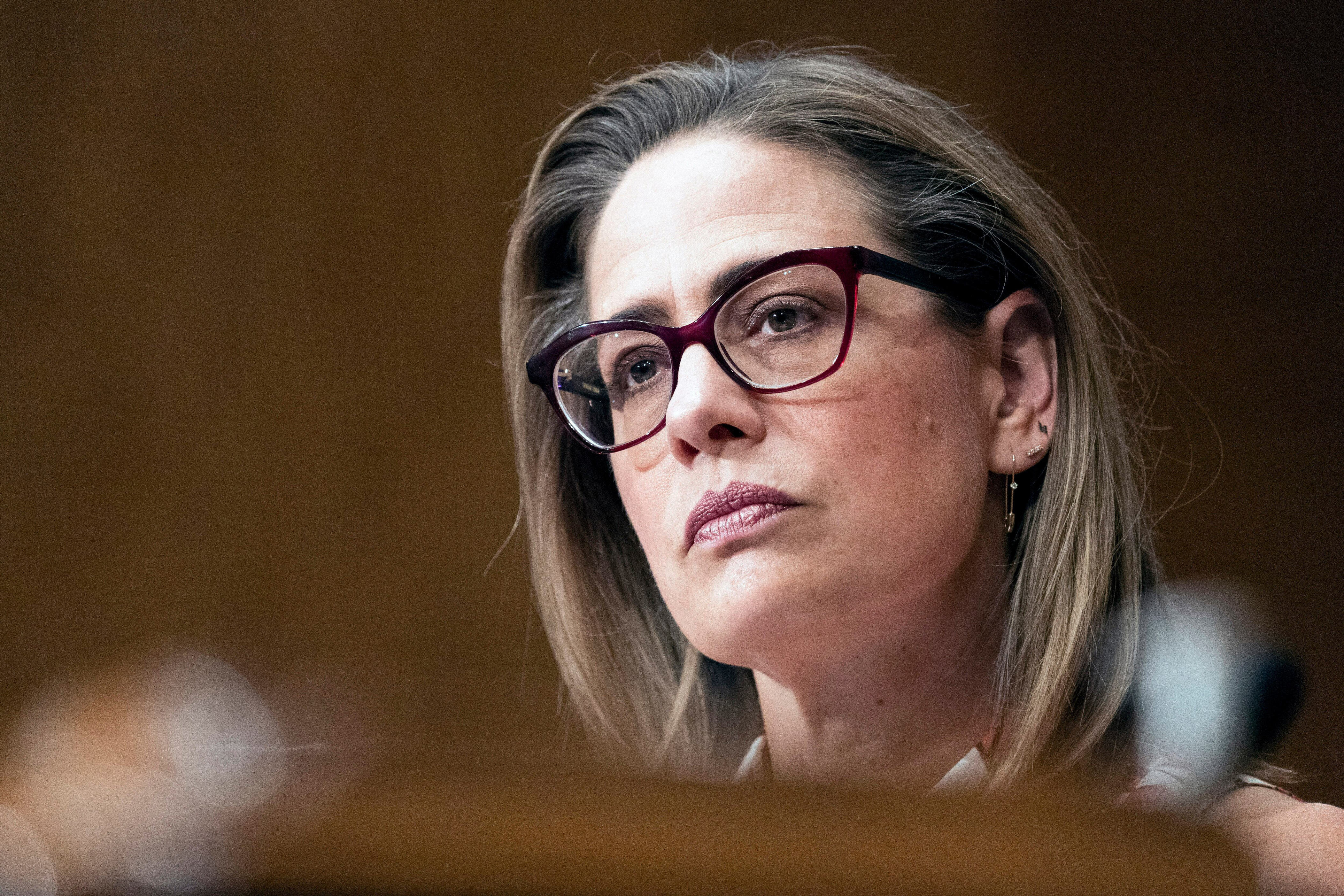 Ex-Sen. Kyrsten Sinema sued over alleged affair with former bodyguard