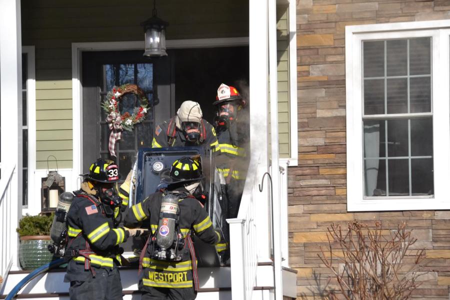 Fire ignites inside oven at Westport home