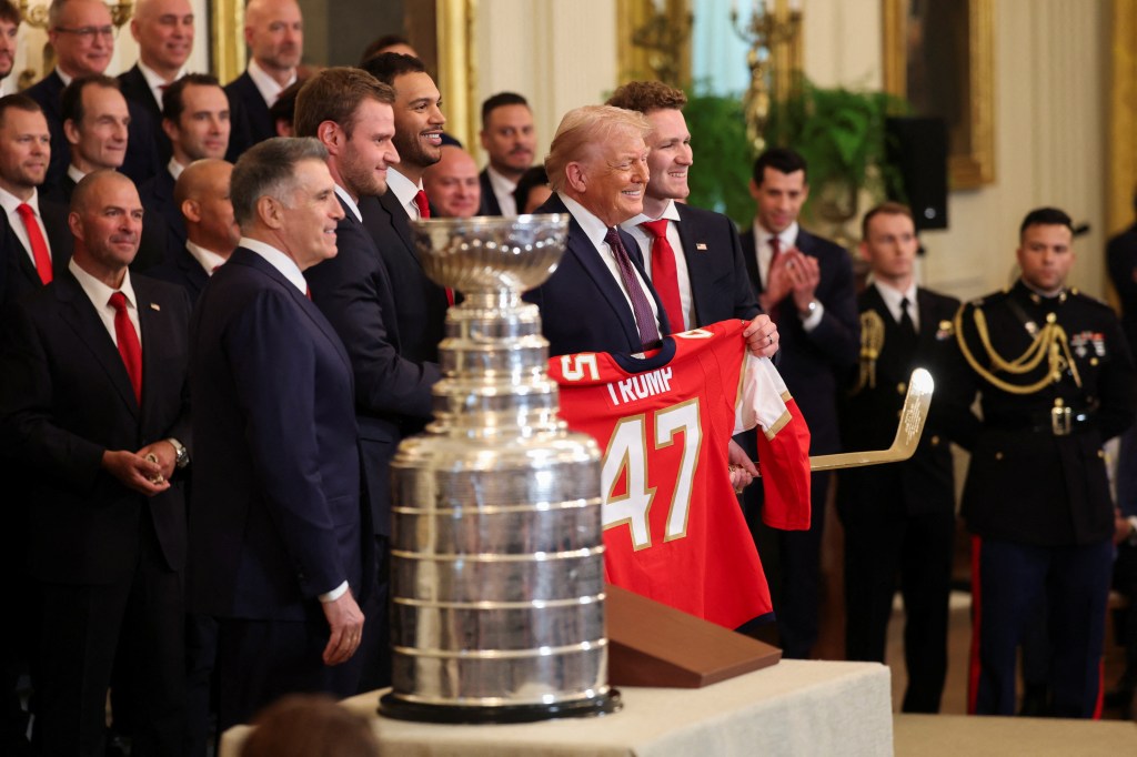Trump shows off his new hockey bling with Stanley Cup champions Florida ...