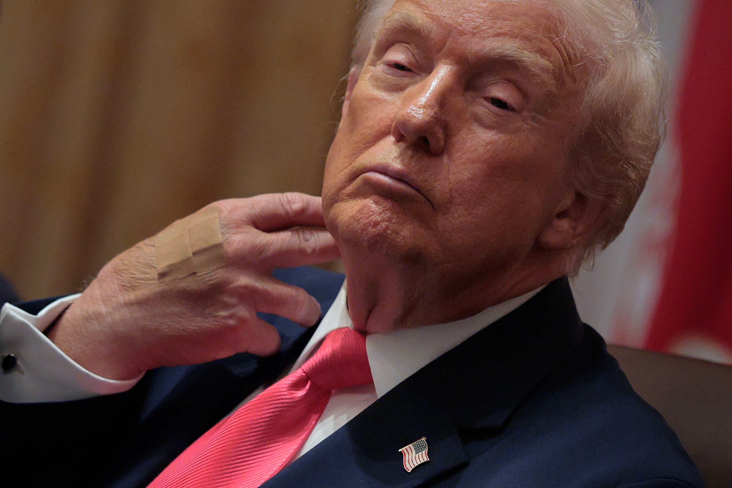 Trump, 79, lathers on hand makeup for bonkers press conference