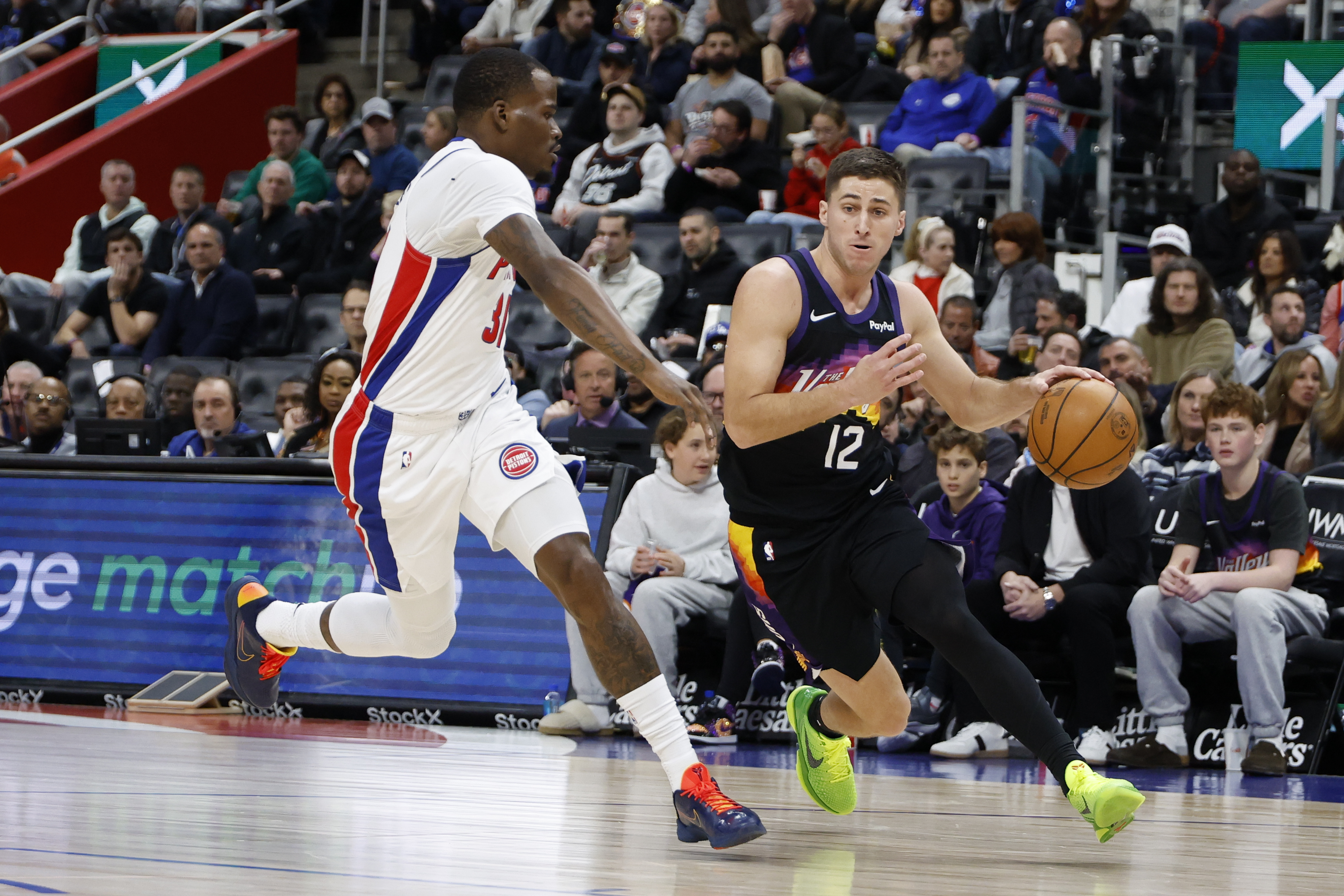 The Devin Booker-less Suns fight, but fall late to the Detroit Pistons ...