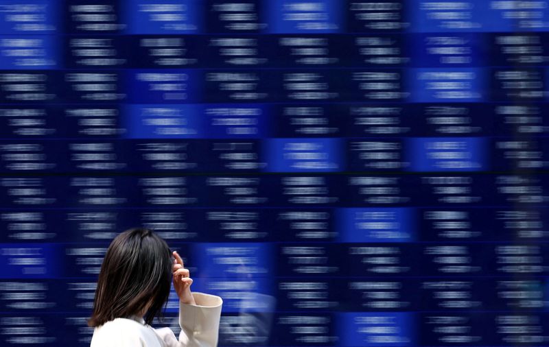 Asia shares near record high on AI optimism, dollar up on receding Fed ...