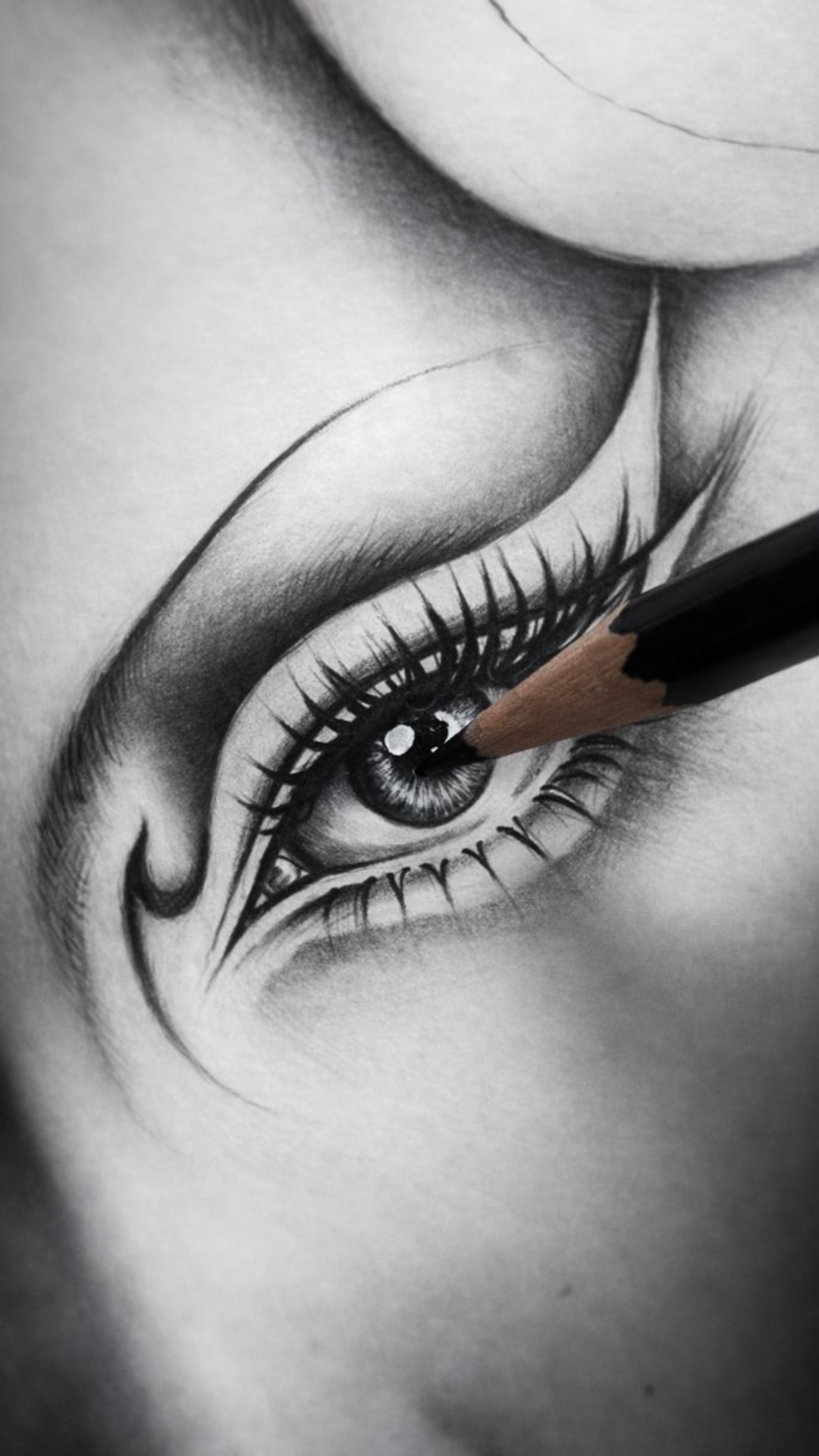 Eye drawing in graphite: Final shading and highlights