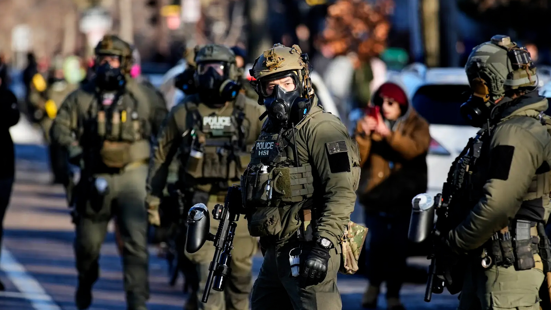 ICE agent shoots Minneapolis man in leg, DHS says he attacked officer ...