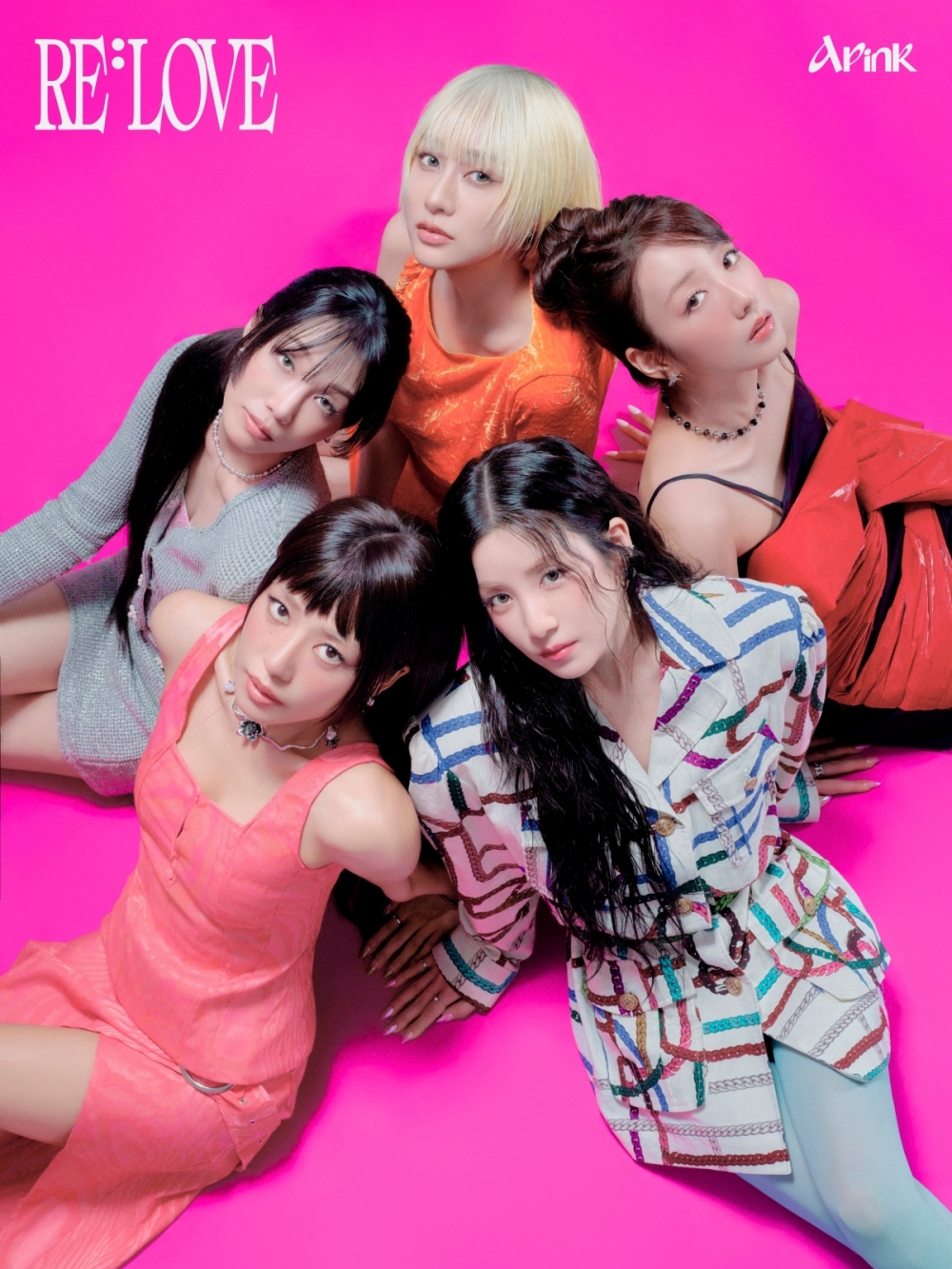 Apink scores their first 15th-anniversary No. 1 with 'Love Me More' on the stage of their first ...