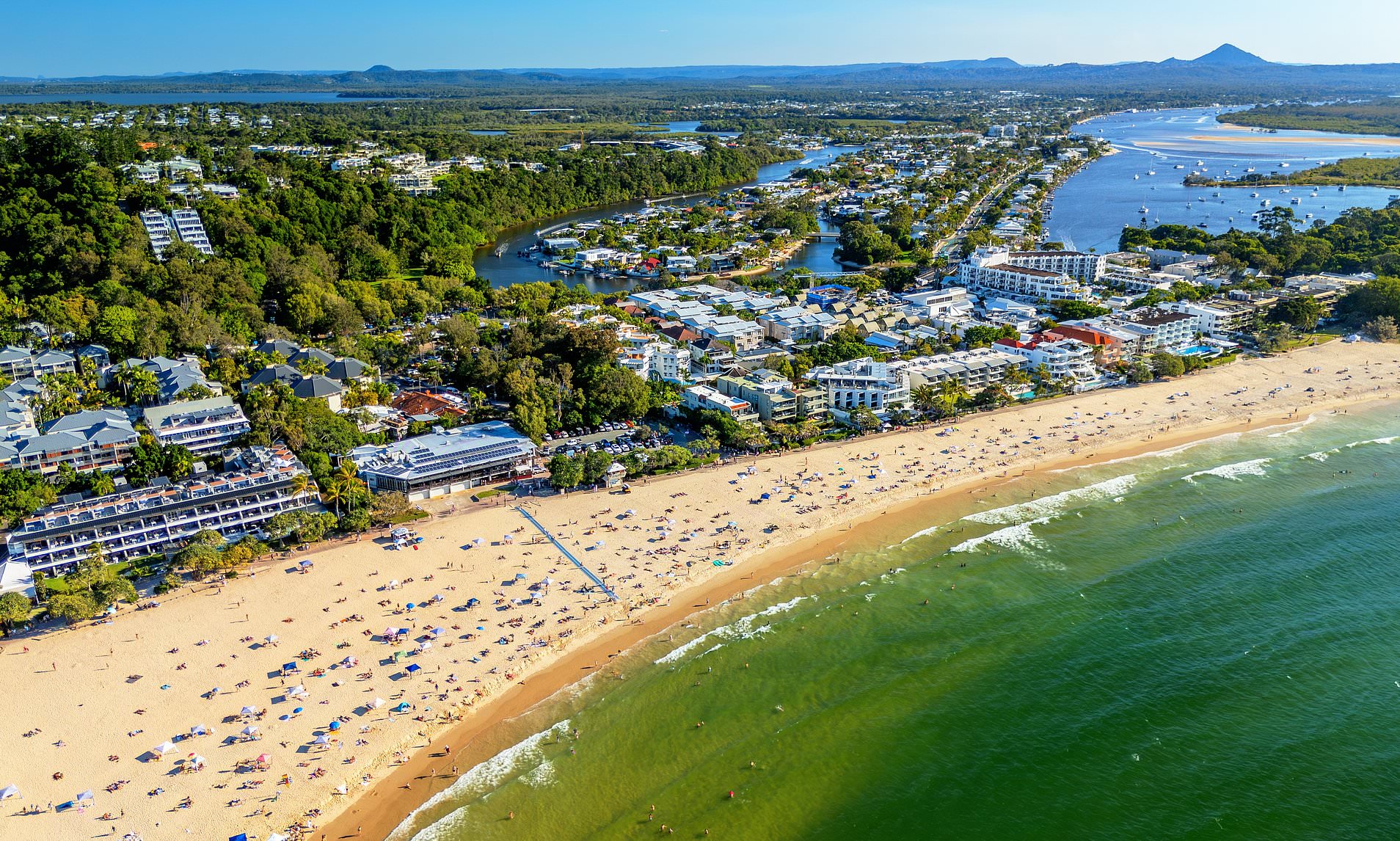 Cops descend on popular beachside suburb after reports of 'shots being ...