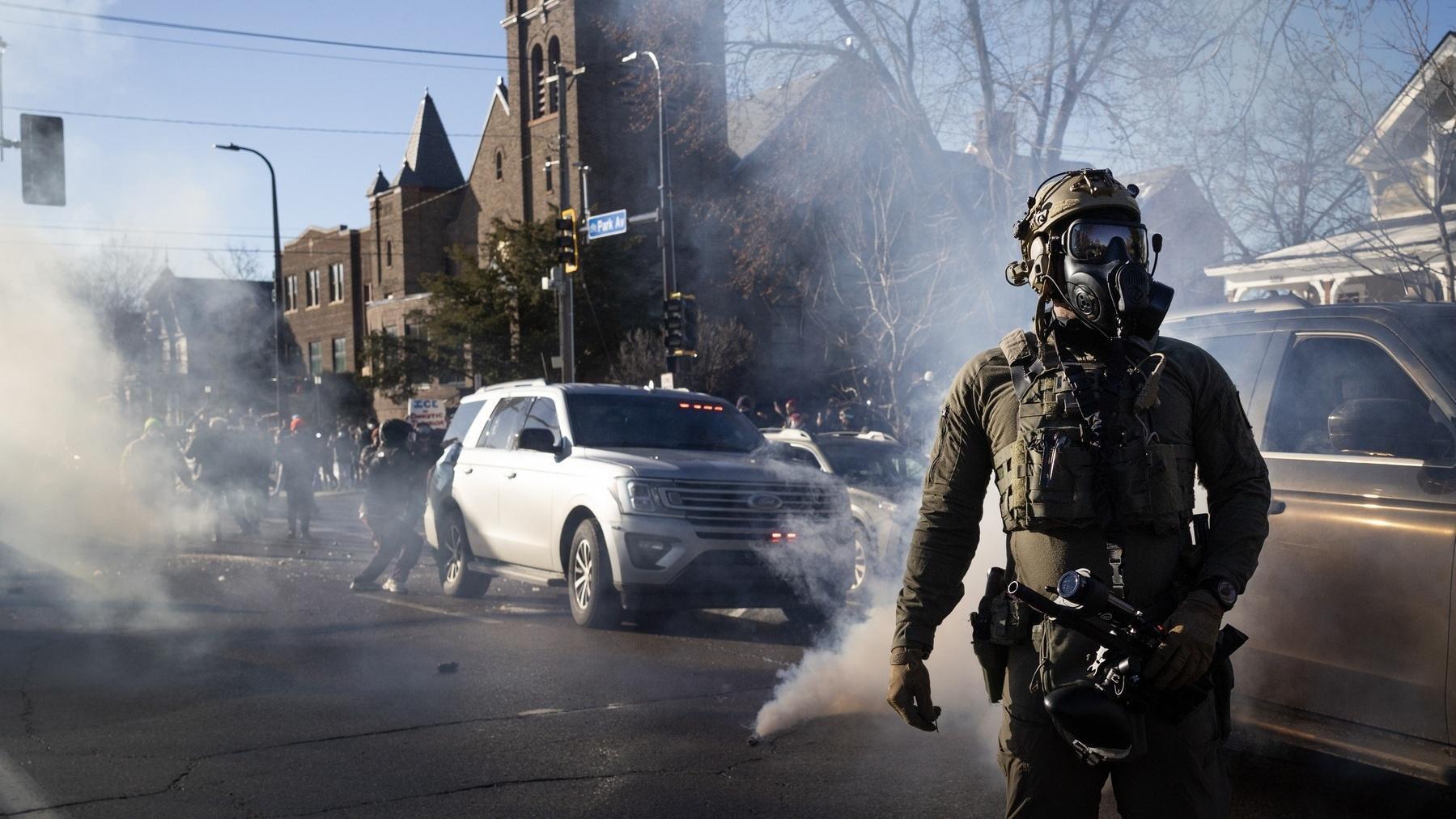 Trump warns of military action after Minneapolis shooting