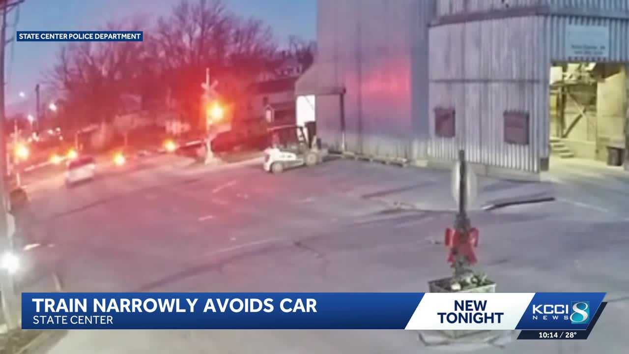 Video shows van narrowly escaping train collision in Iowa