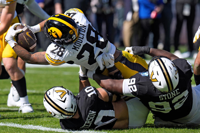 Federal judge denies injunction for college football players seeking to ...