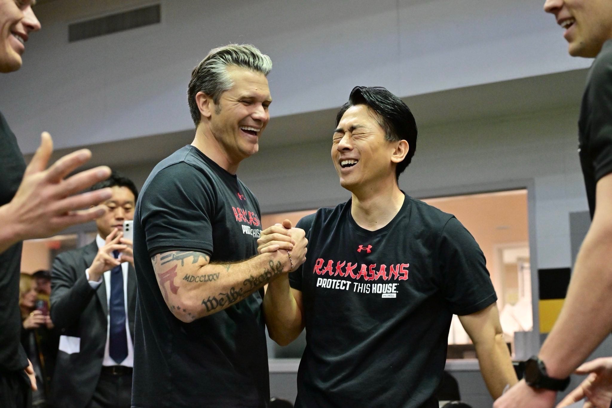 US and Japan defense chiefs show alliance with dawn push-ups