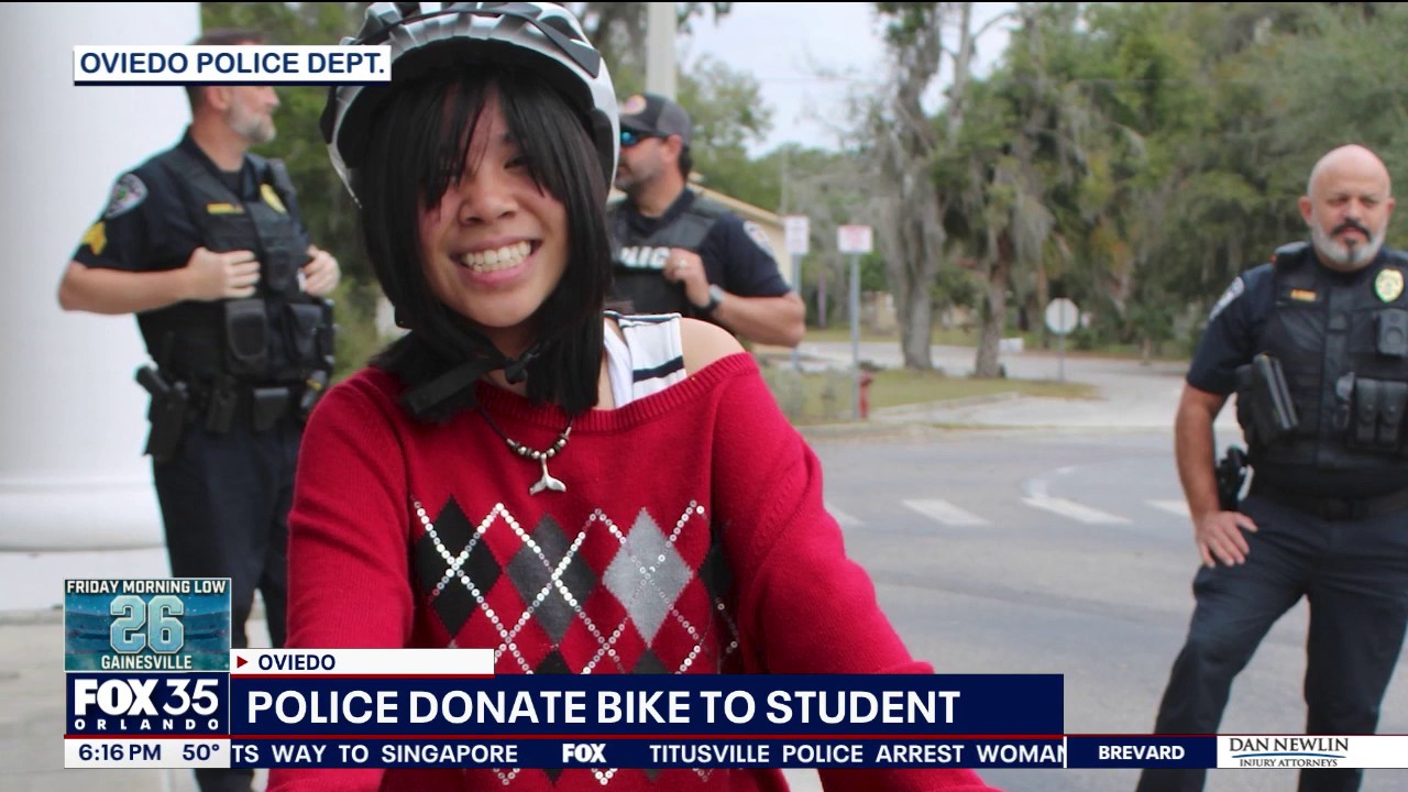 Oviedo police officers gift student bike to get to school safely