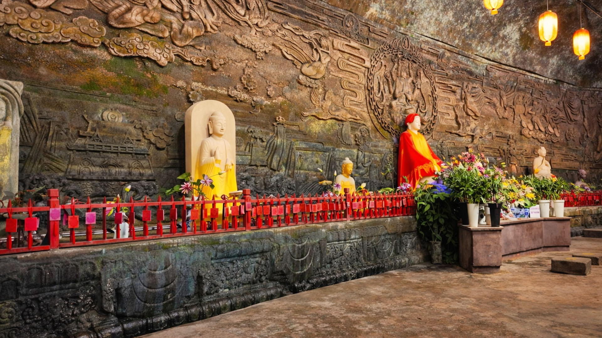 Buddha statues and carvings fill this cave in Leshan