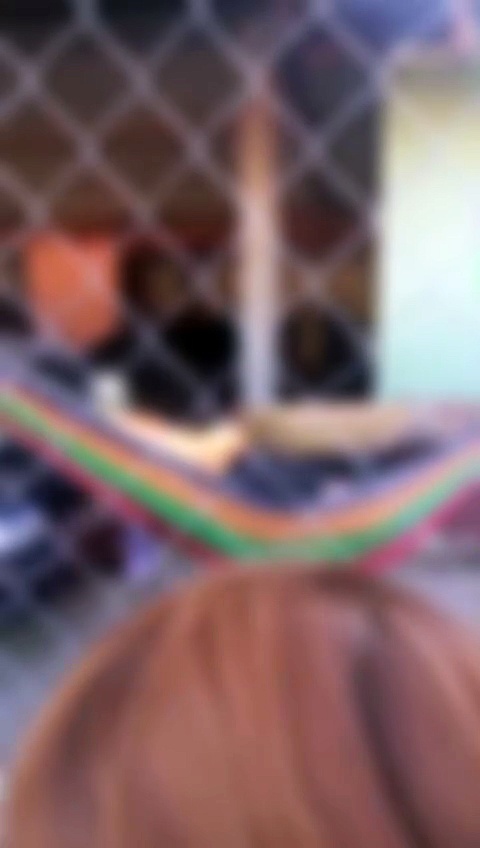 Hombre en una hamaca en San Lorenzo, Valle