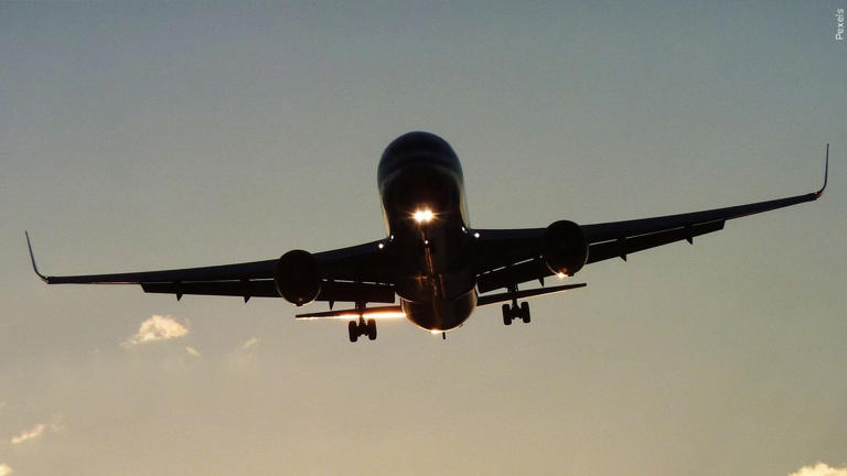 Man sentenced for trying to open emergency door on Omaha flight