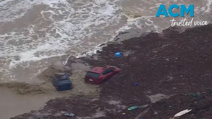 Cars swept into ocean as massive rainbomb hits south-west Victoria