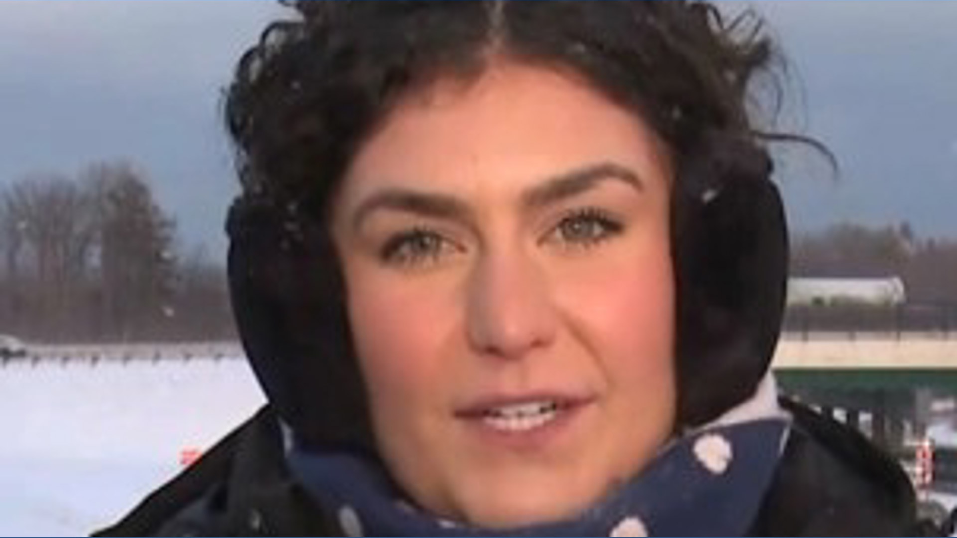 Kristen Mirand makes a snow angel live during 3News at 5