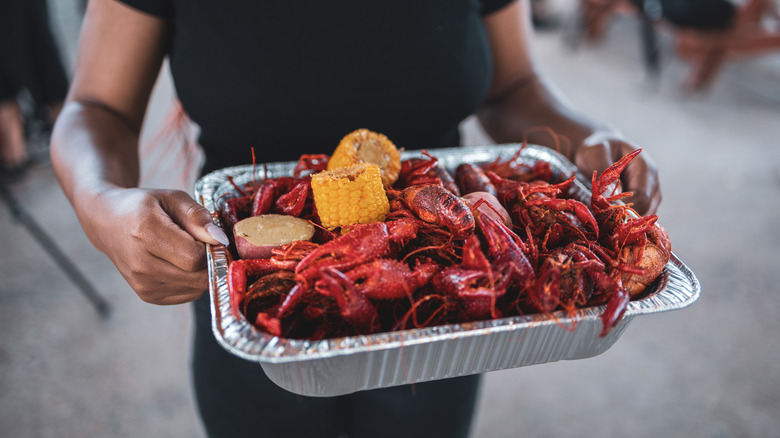 Don't toss this part of the crawfish — it tastes a lot better than it looks