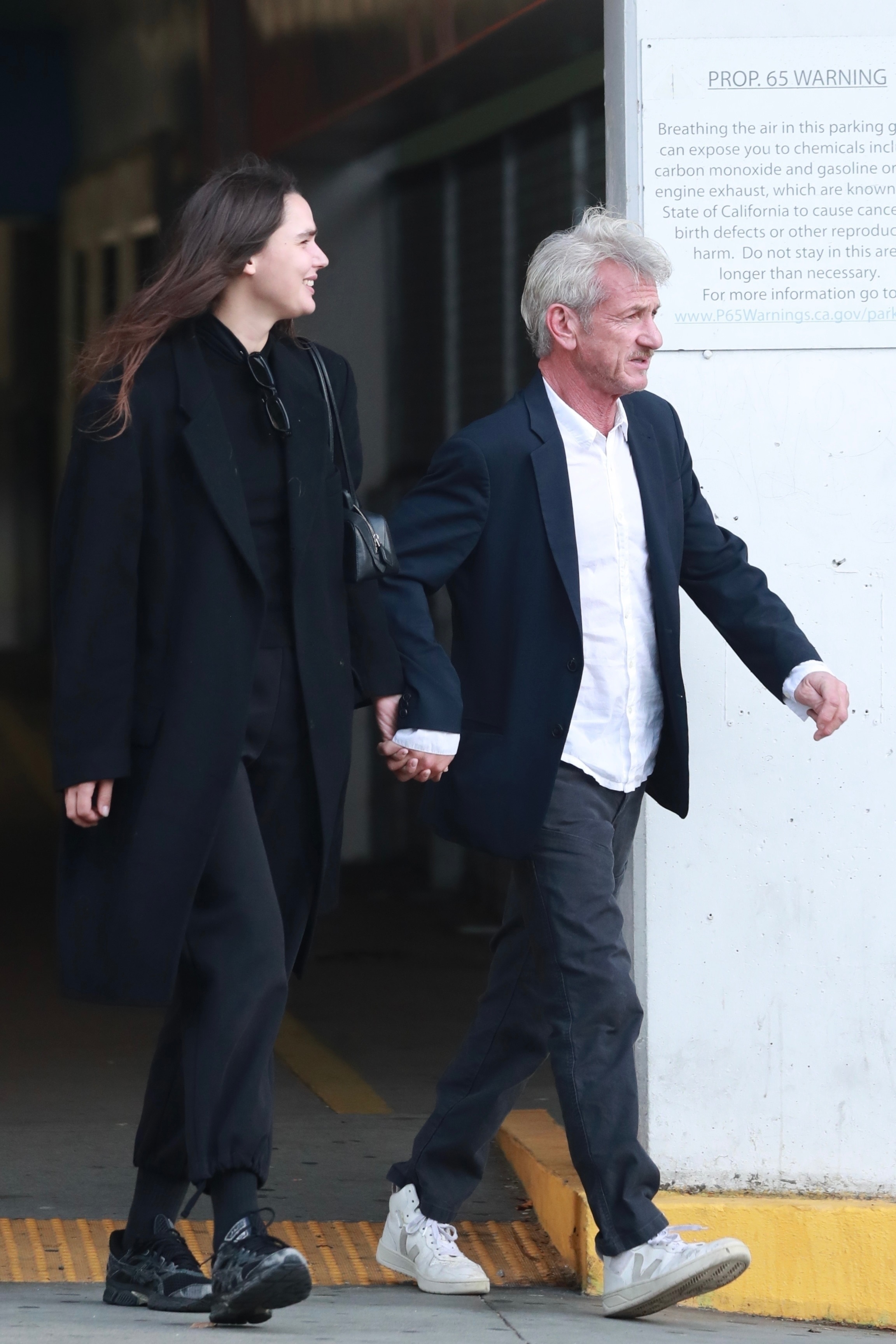 Sean Penn, 65, and much-younger girlfriend, 30, hold hands on rare ...