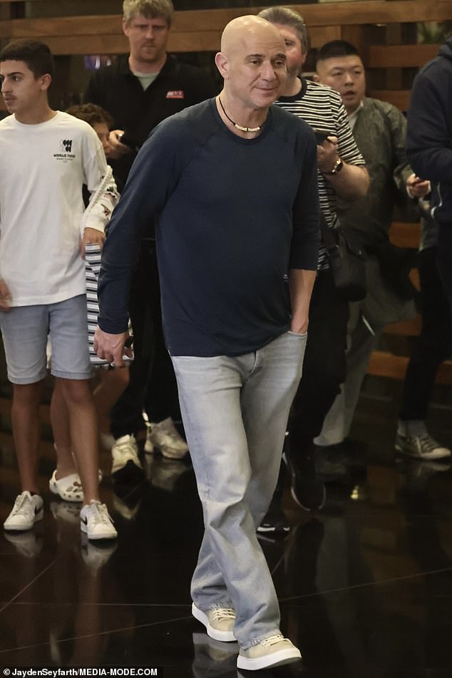 Tennis legend looks almost unrecognisable after touching down in ...