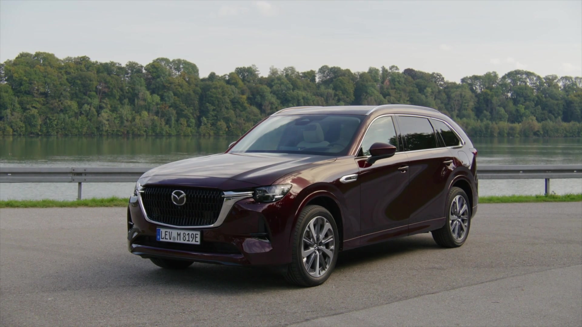2026 Mazda CX-80 design preview in artisan red