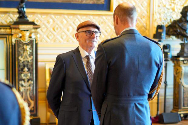 Frank Rothwell says OBE ceremony 'proper' but cap was always there to stay