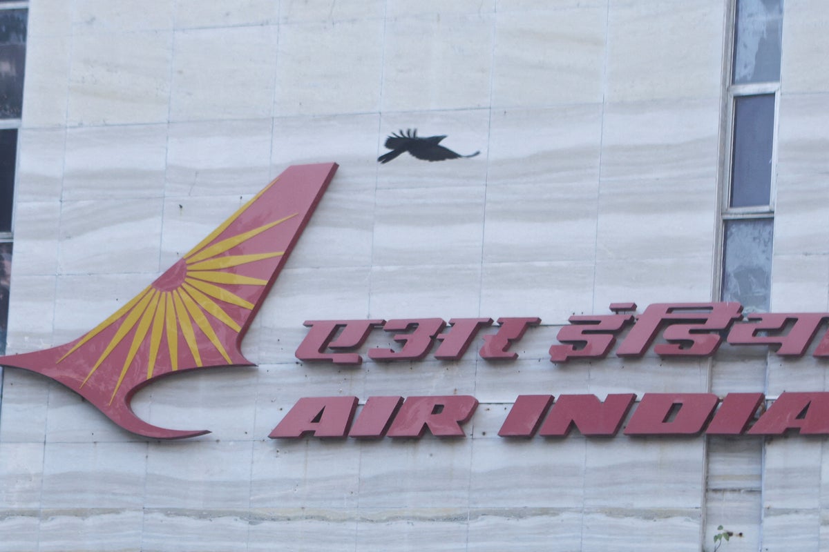Air India flight grounded after engine sucks in baggage container