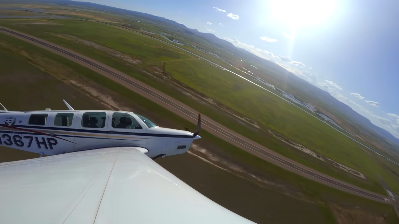 Pilots found a crashed airplane in a field near the runway