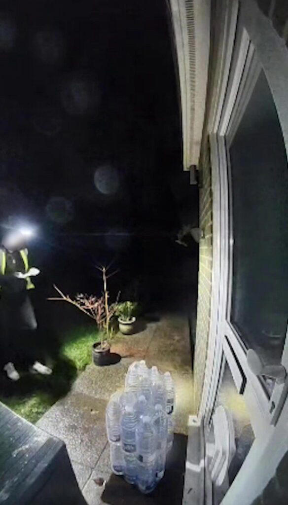 Delivery man caught on Ring camera removing emergency water bottles ...