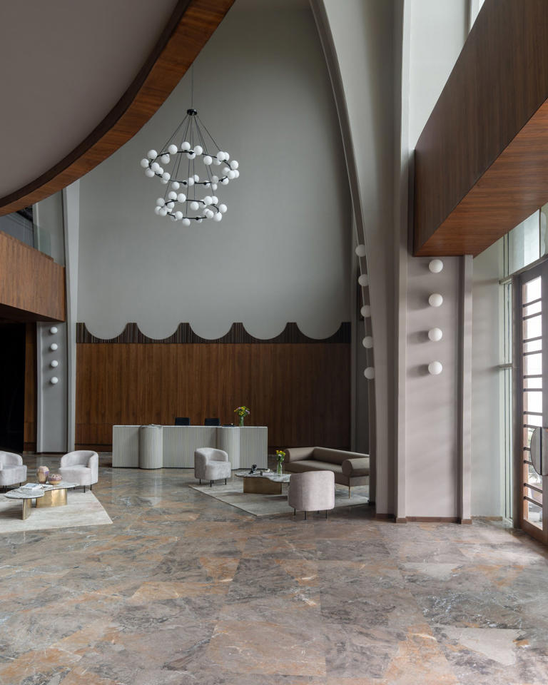 Meditative lighting and Banarasi brocade panels decorate Jain community ...