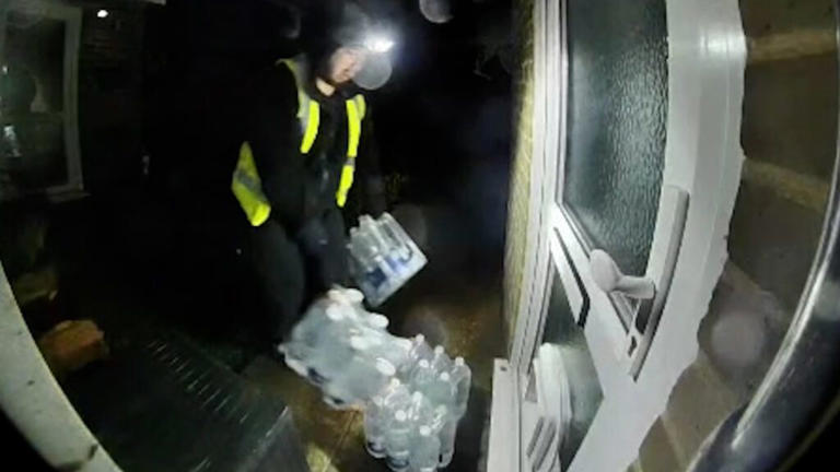 Delivery man caught on Ring camera removing emergency water bottles ...