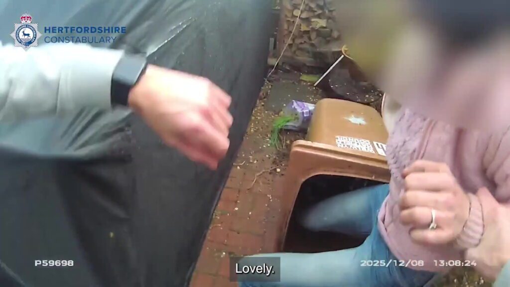 Moment cops find shoplifter hiding in wheelie bin