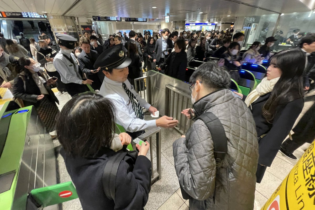 Chaos for commuters on Tokyo metro as rare power outage halts services