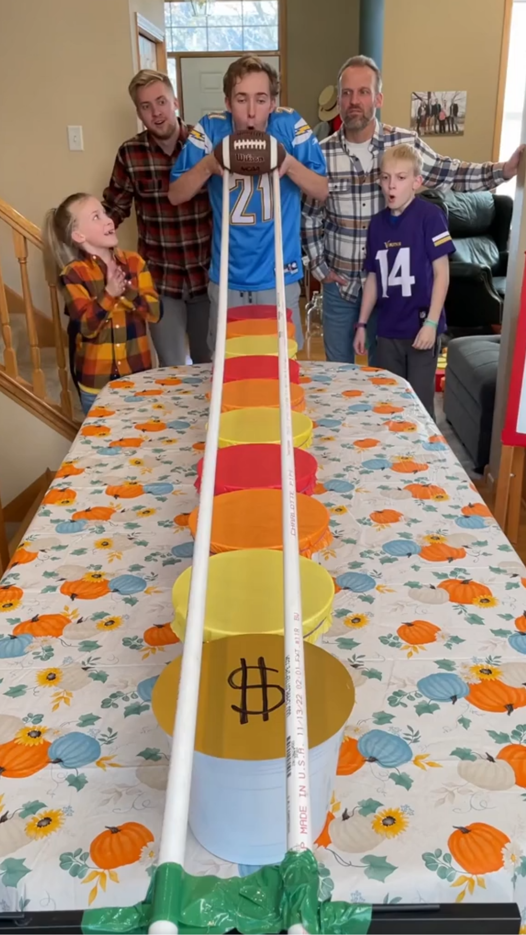 Family football roll game fun challenge
